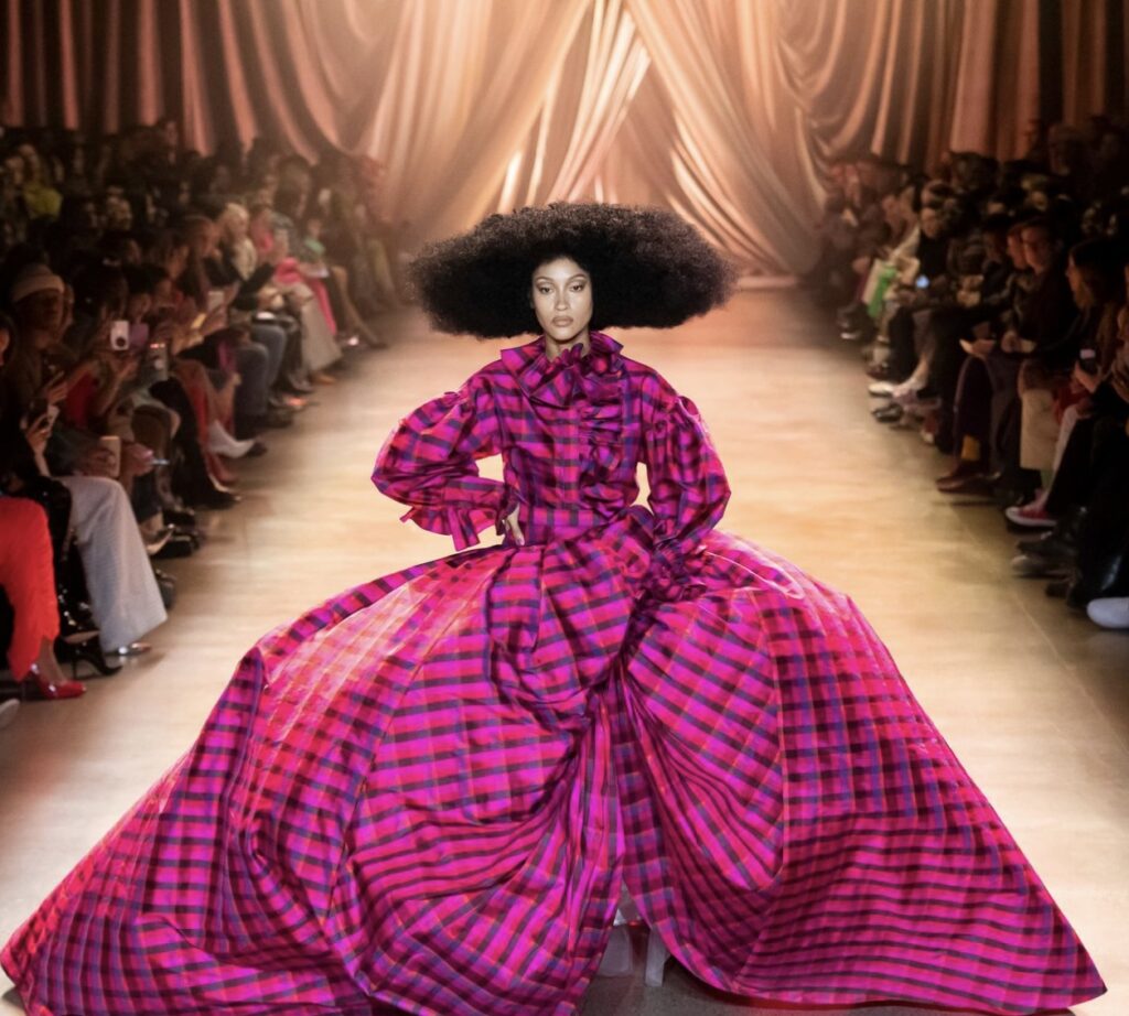 Understanding The History Of Fashion Week - SAXS